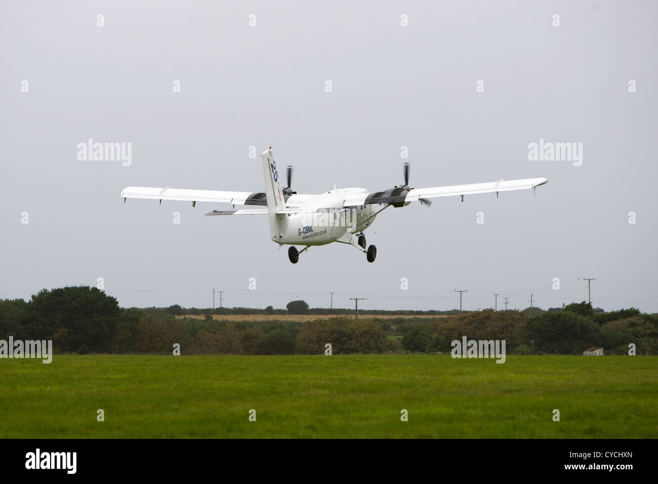An Islander aircraft taking off from Lands End Airport Stock Photo - Alamy