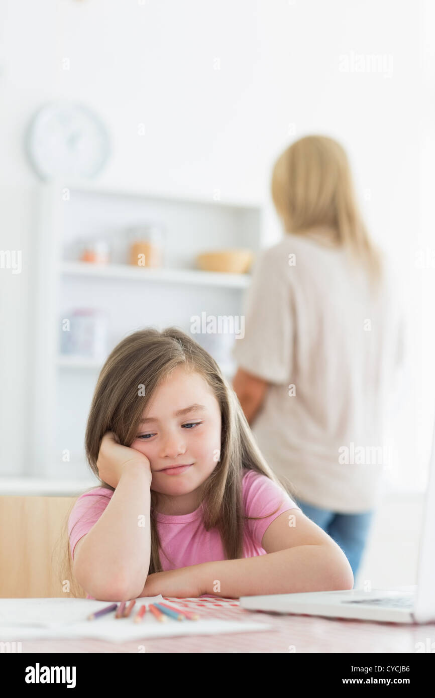 Little girl bored with drawing Stock Photo - Alamy