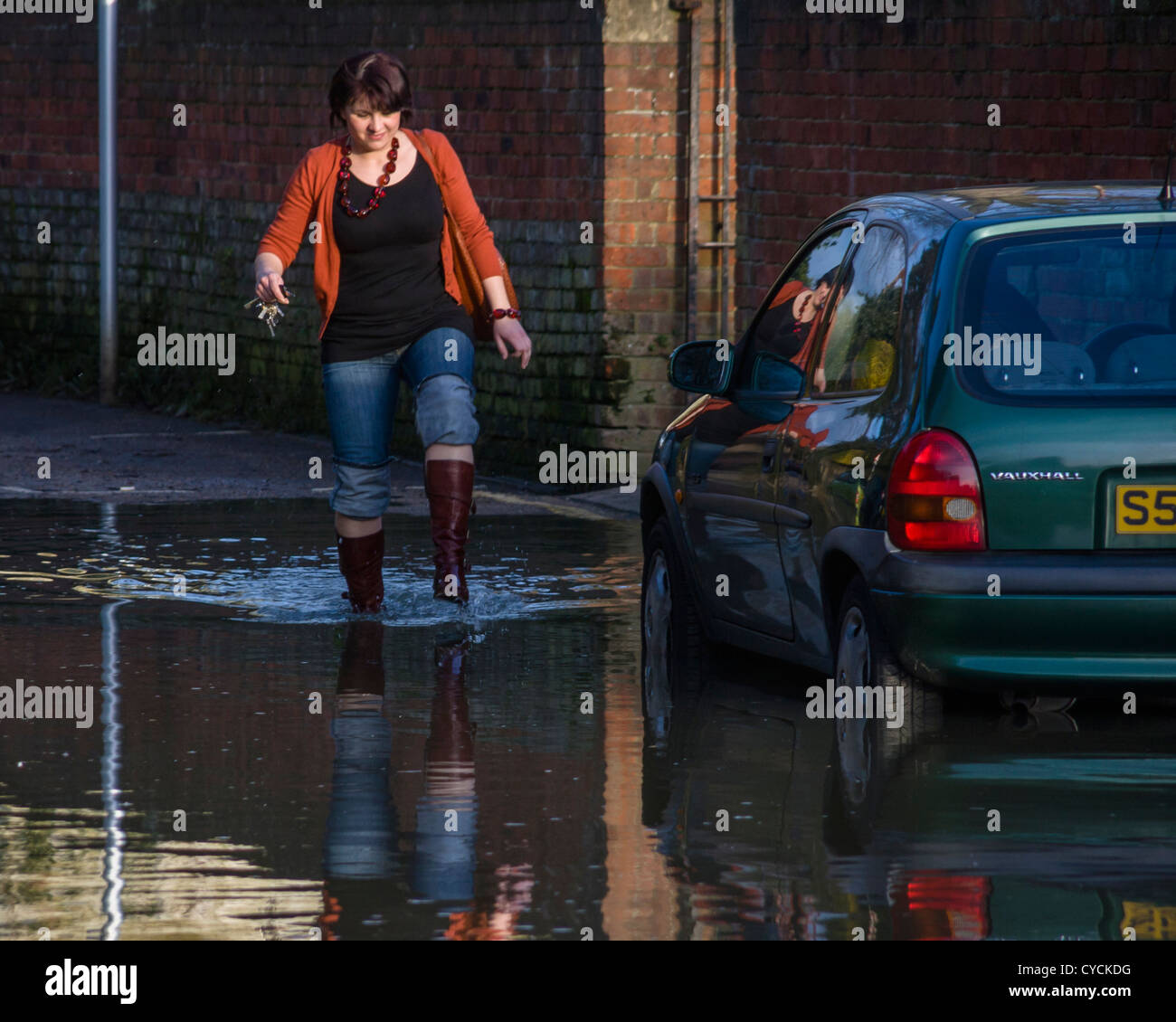 Walking through flood water hi-res stock photography and images - Alamy