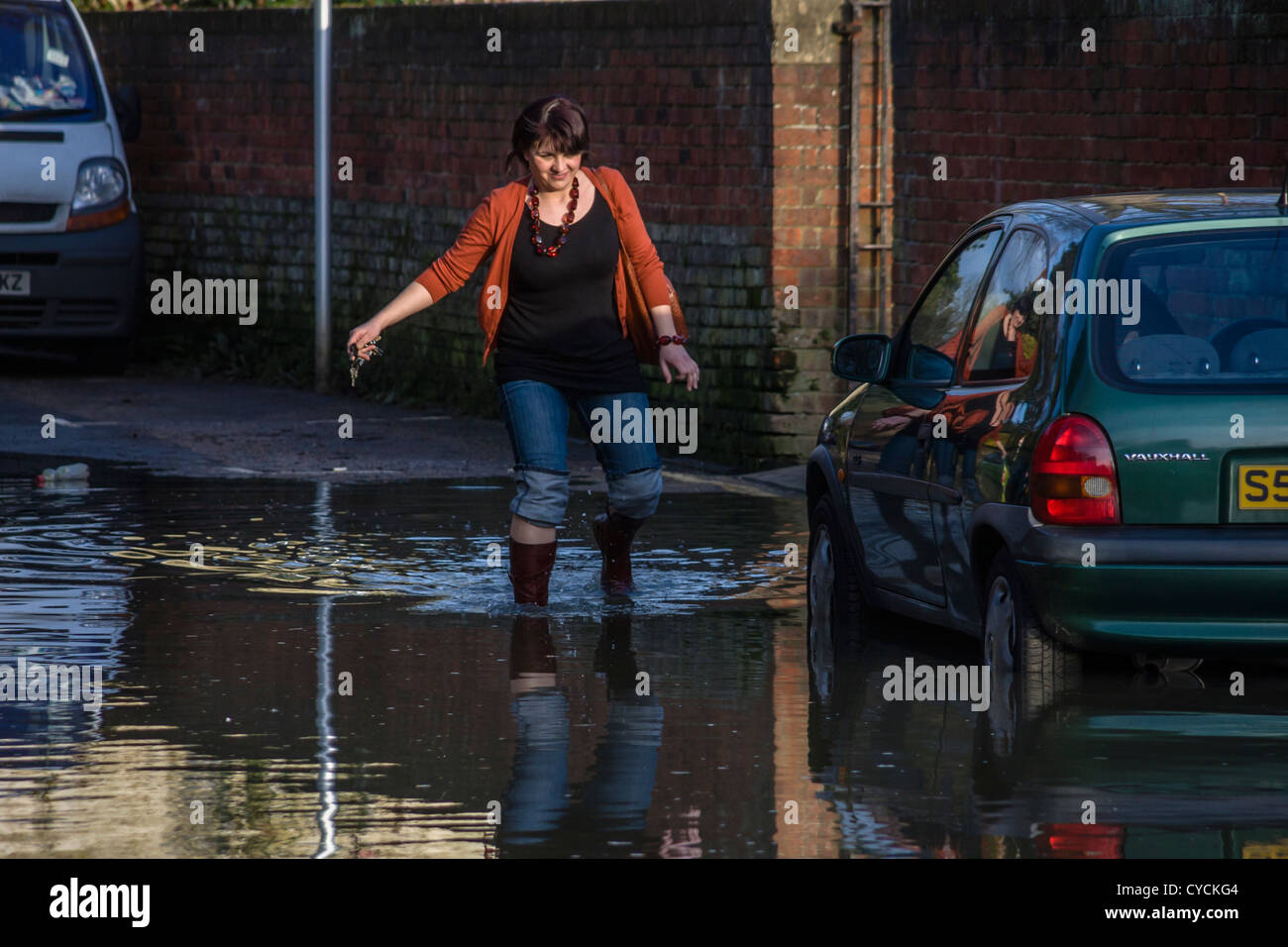 Walking through flood water hi-res stock photography and images - Alamy