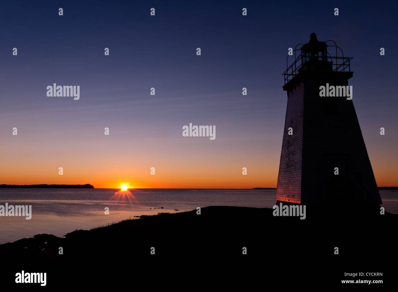 Lighthouse during sunrise in the early morning with beautiful colors ...
