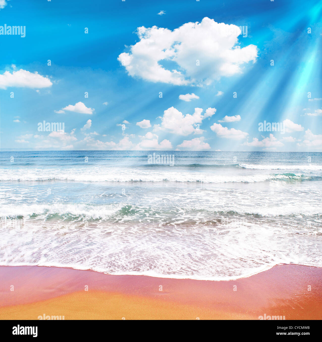 Tropical beach and blue sky with sunrays Stock Photo - Alamy
