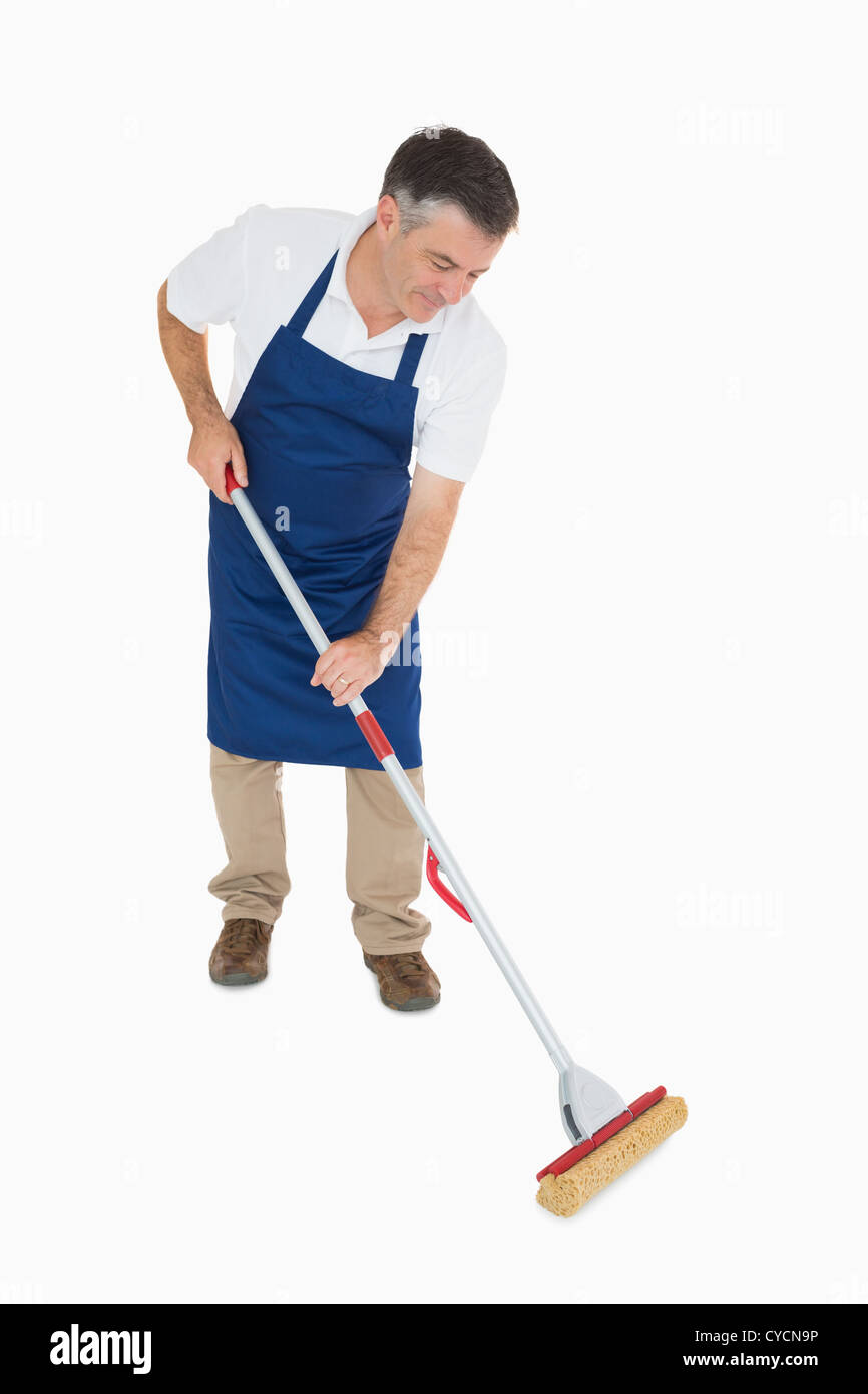 Man mopping the floor Stock Photo - Alamy
