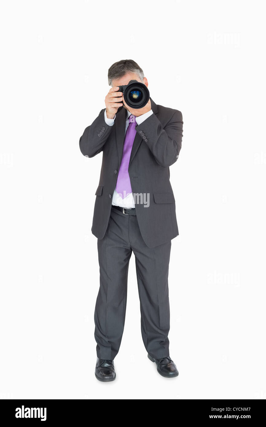 Man using camera Stock Photo - Alamy