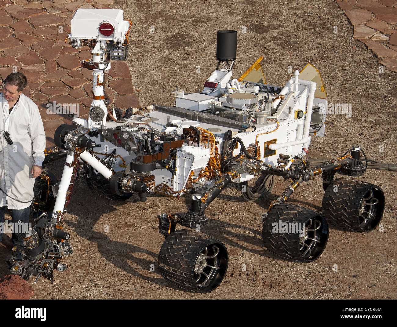 Engineers at NASA's Jet Propulsion Laboratory (JPL) compare three ...