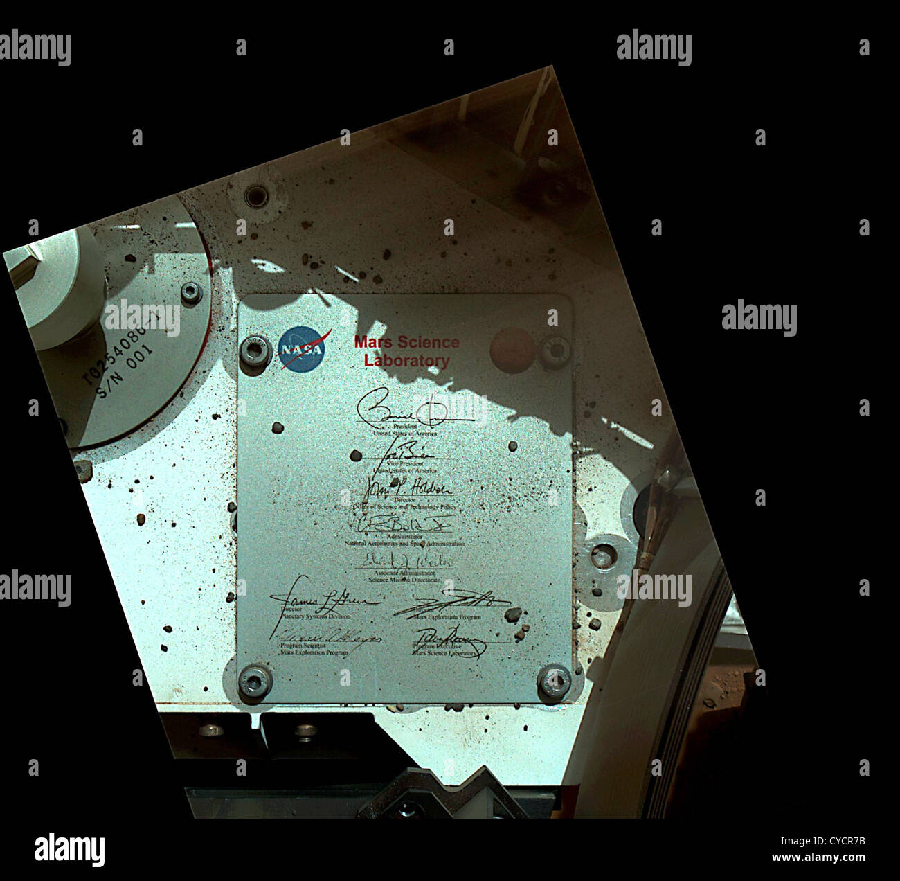 The Curiosity rover, on Mars, captured an image of a plaque featuring ...