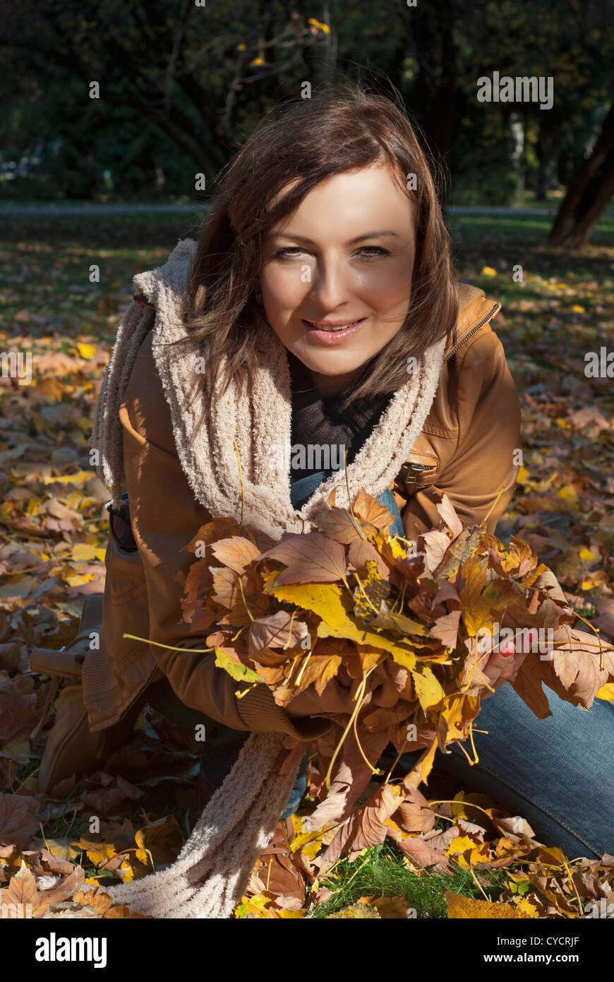 Fall woman in yellow leaves portrait Stock Photo - Alamy