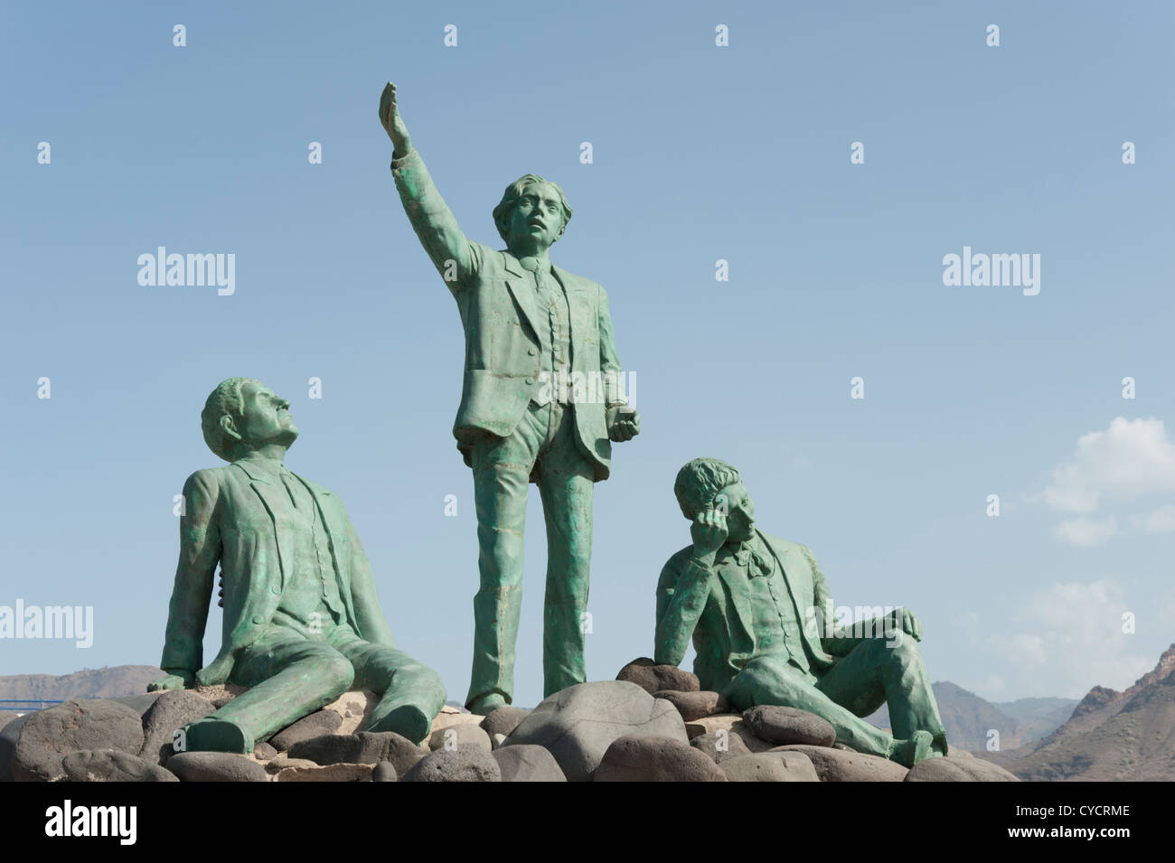 Statues of local men at Puerto de las Nieves Gran Canaria Canary ...