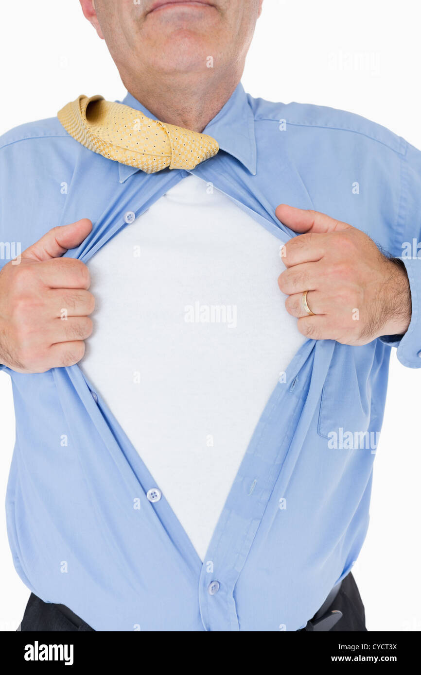Man tearing his shirt Stock Photo - Alamy