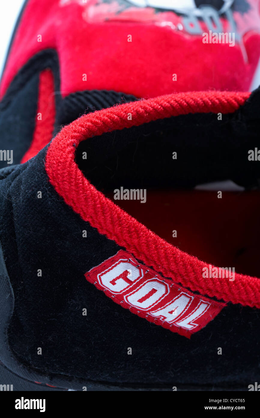 goal label on pair of boy's football slippers Stock Photo - Alamy