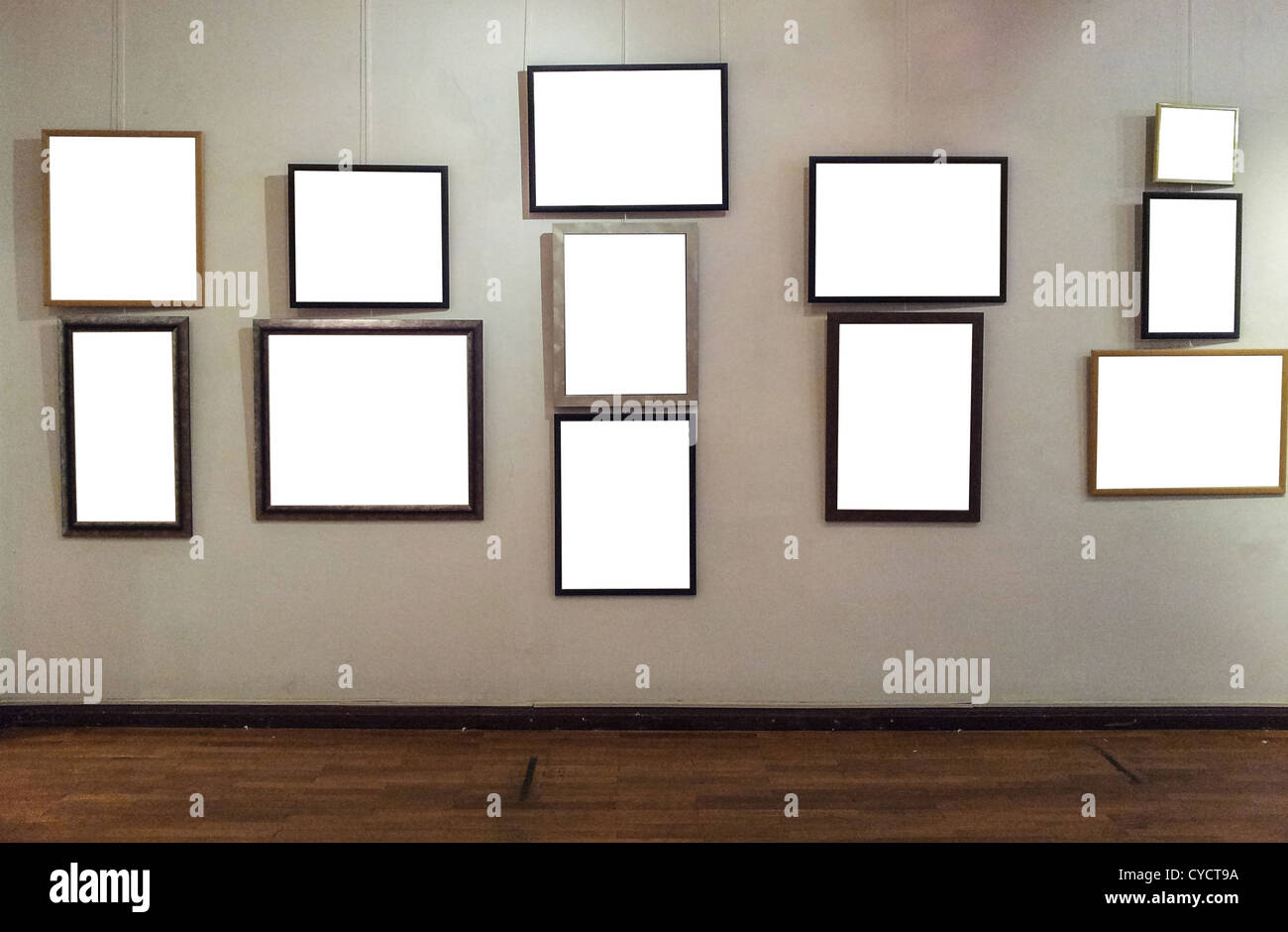 Blank photo frames on gallery wall Stock Photo - Alamy