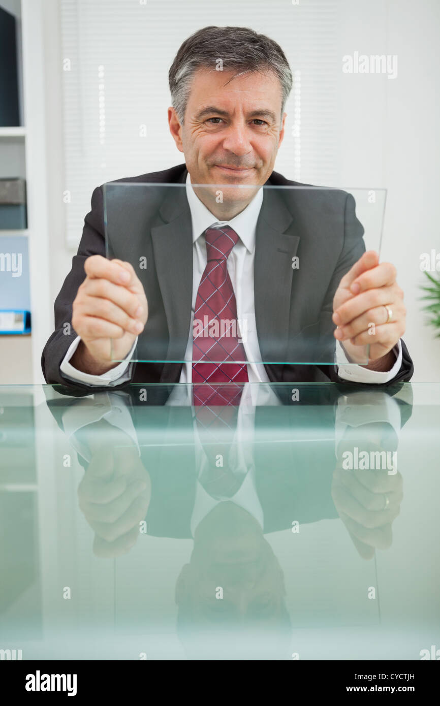 Smiling man with his virtual screen Stock Photo - Alamy