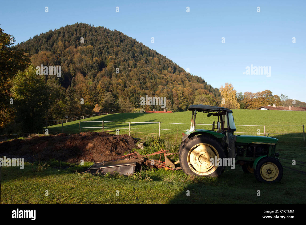 Agriculture farm tractor mountain hi-res stock photography and images ...