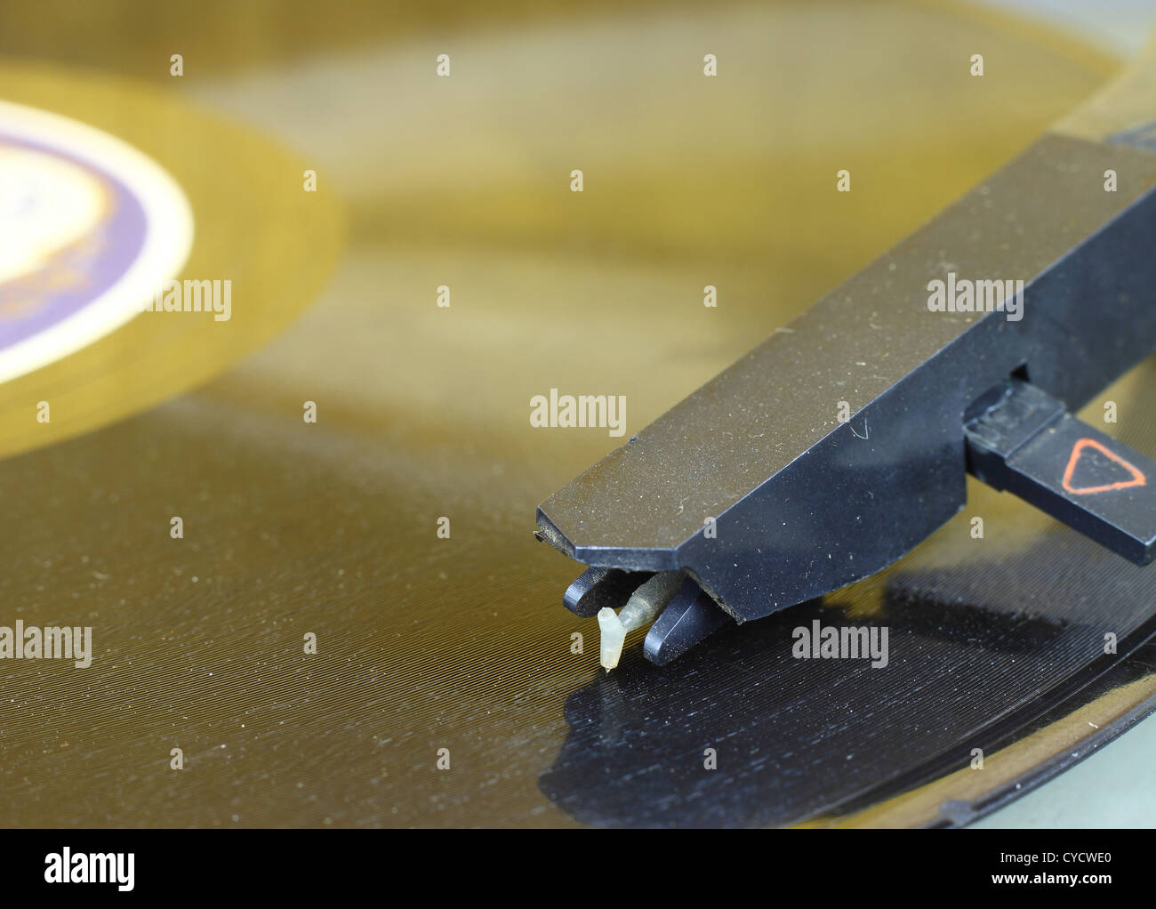 Retro music record plate and tonearm head macro closeup Stock Photo - Alamy