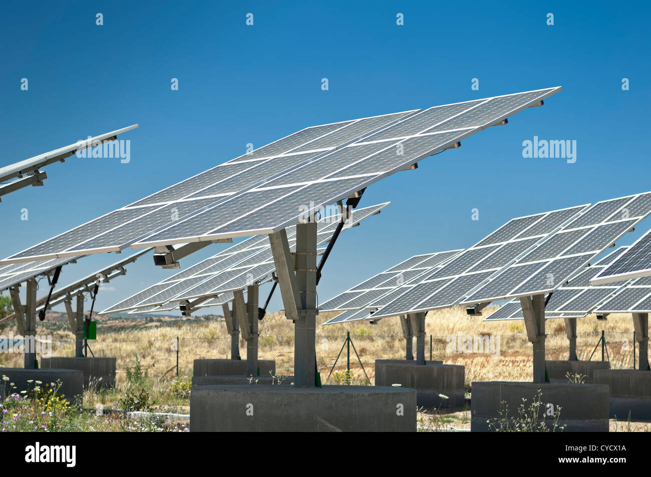 Photovoltaic silicon panels with tilted single axis track system in a ...