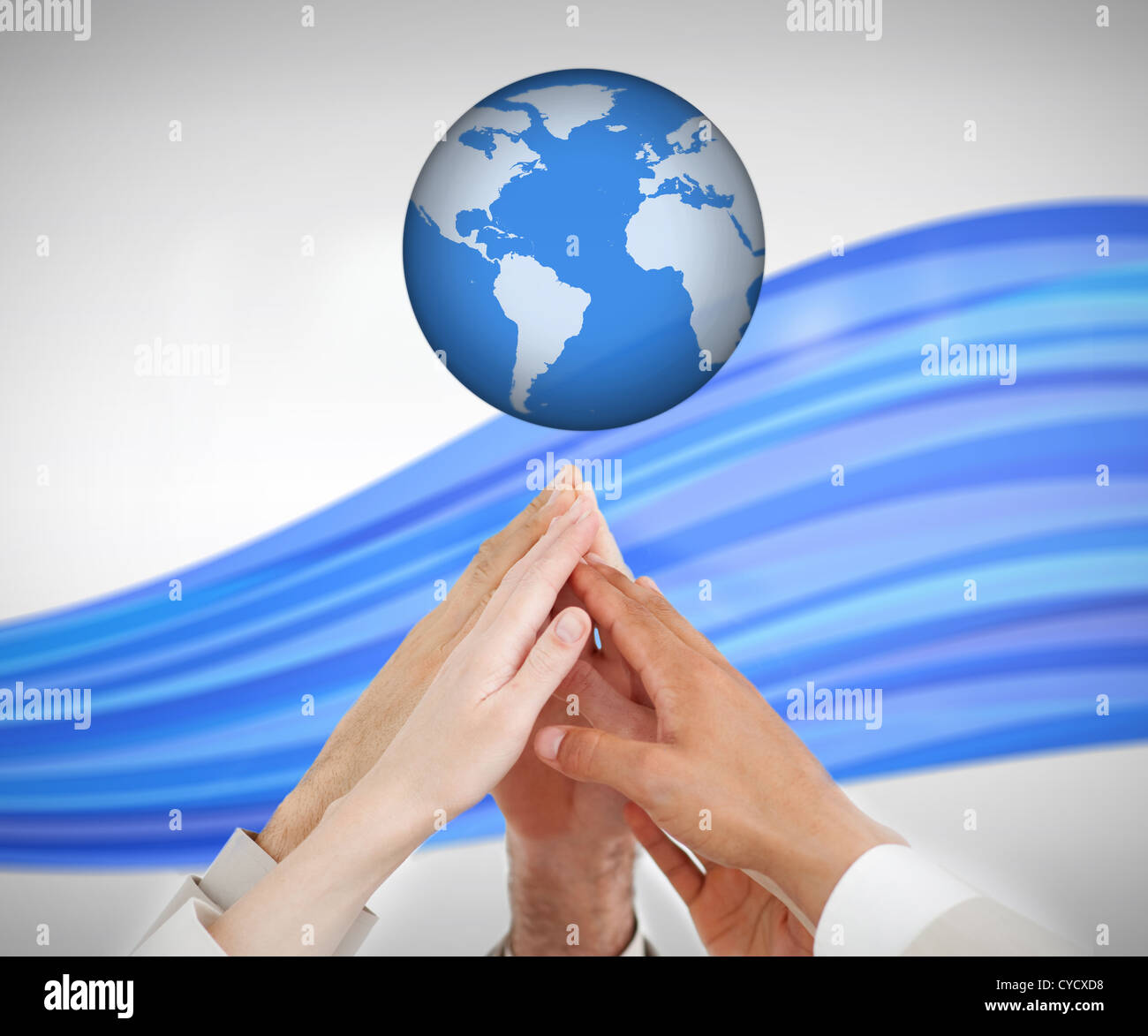 People reaching hands up to globe Stock Photo - Alamy
