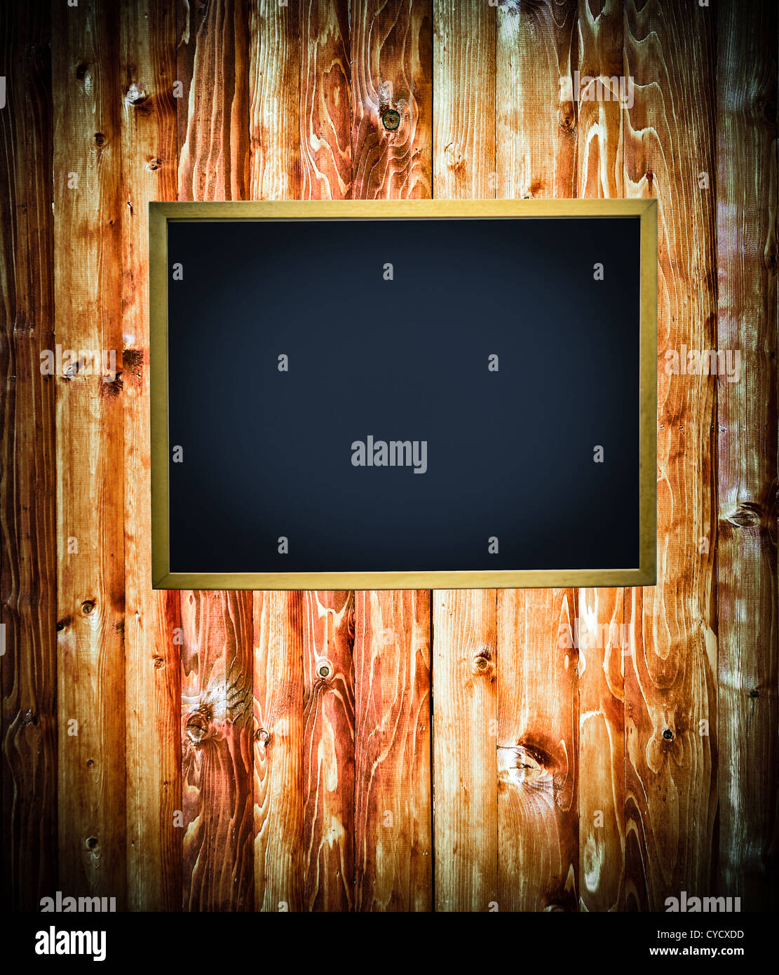 Empty board on wooden wall Stock Photo - Alamy