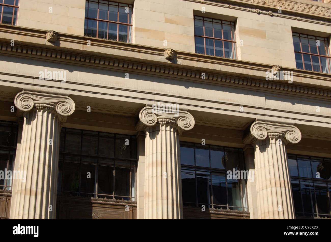 Columns on the facade of sandstone city centre building in Glasgow ...