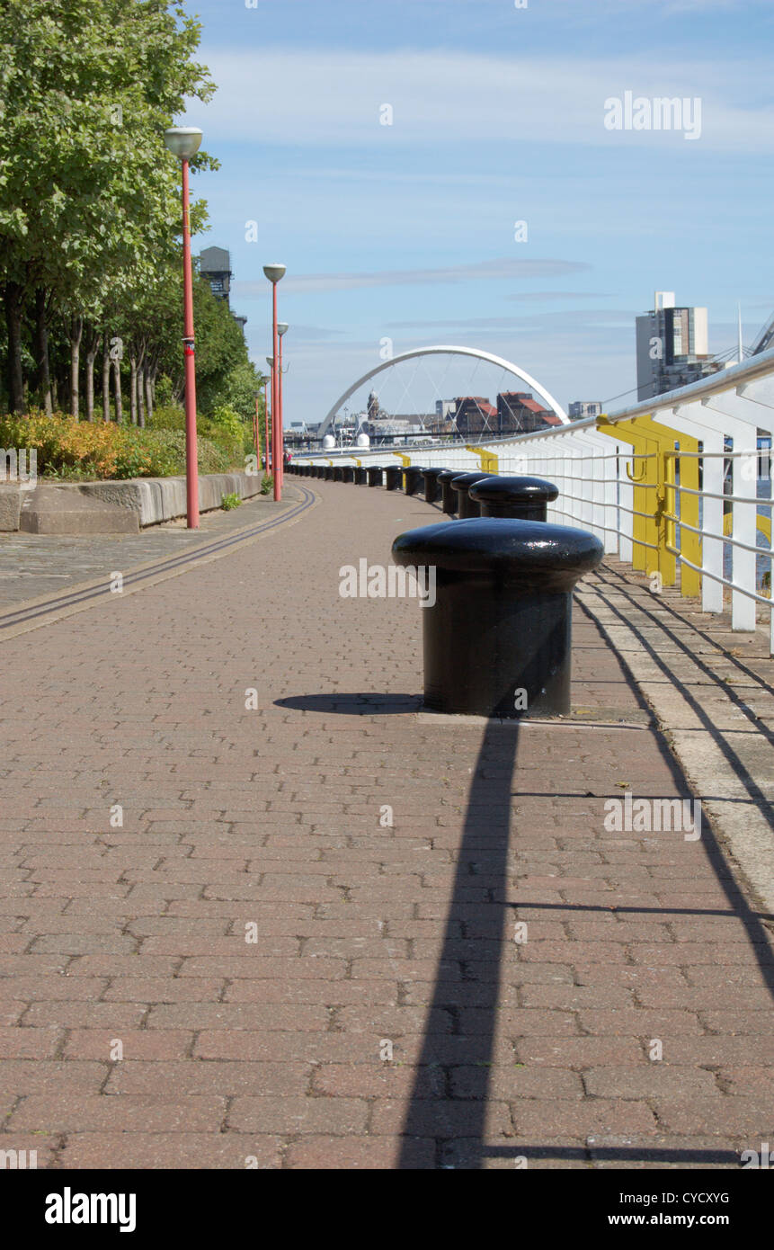 Waterfront pathway and railing on the North bank of the River Clyde in ...