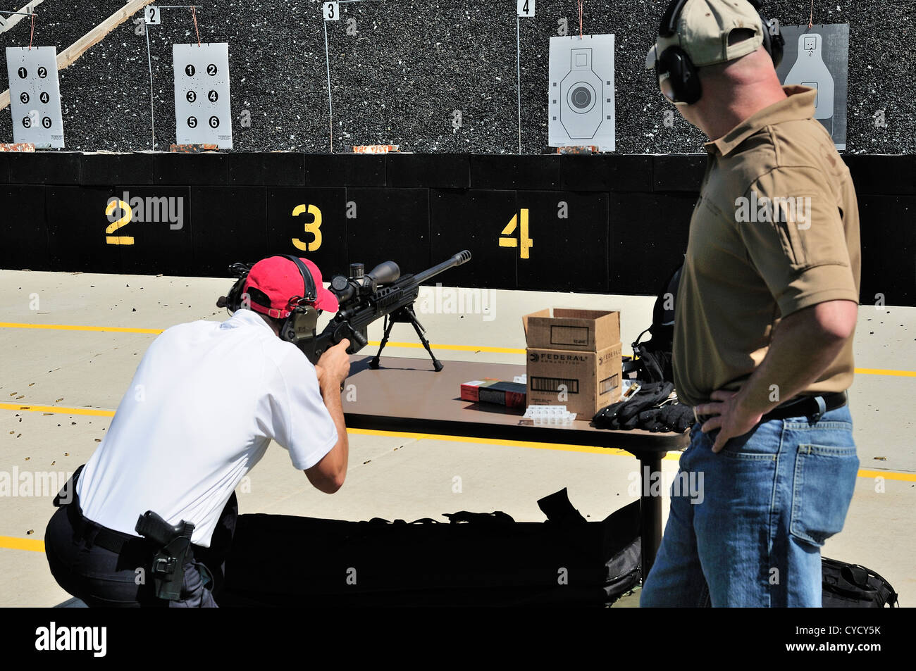 Gunman test firing .338 sniper rifle at the FBI shooting range in ...