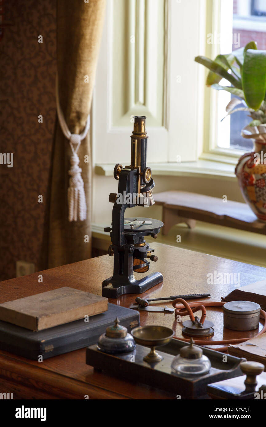 old microscope on the desk of the doctor in ancient times Stock Photo ...