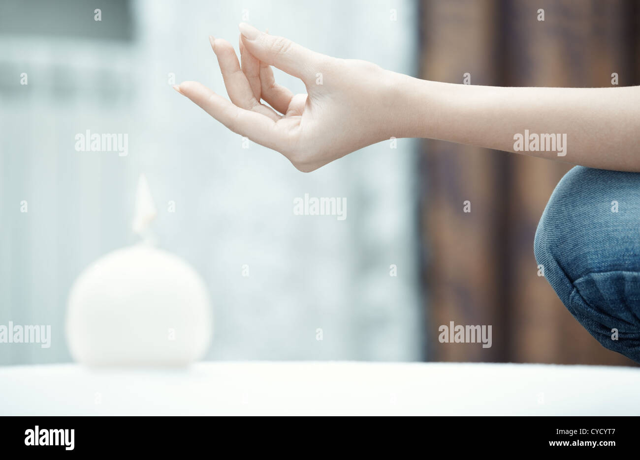 Hand of human practicing yoga at home Stock Photo - Alamy