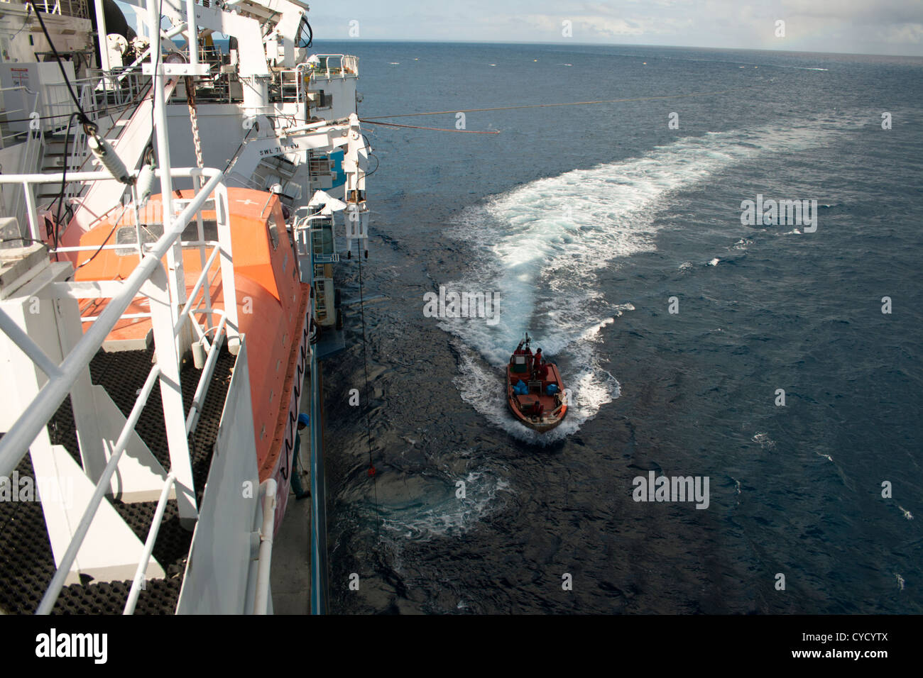 Work boat of the seismic vessel CGG Alize coming along side to be ...