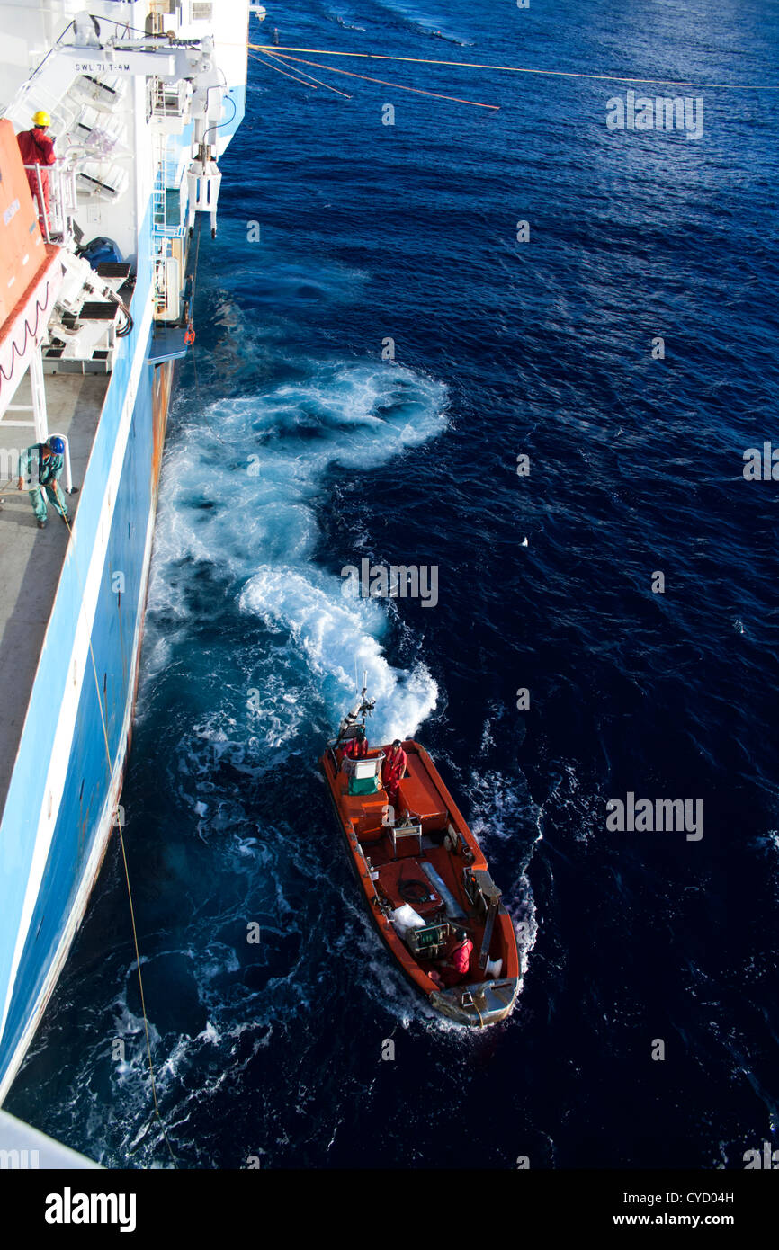 Work boat of the seismic vessel CGG Alize coming along side to be ...