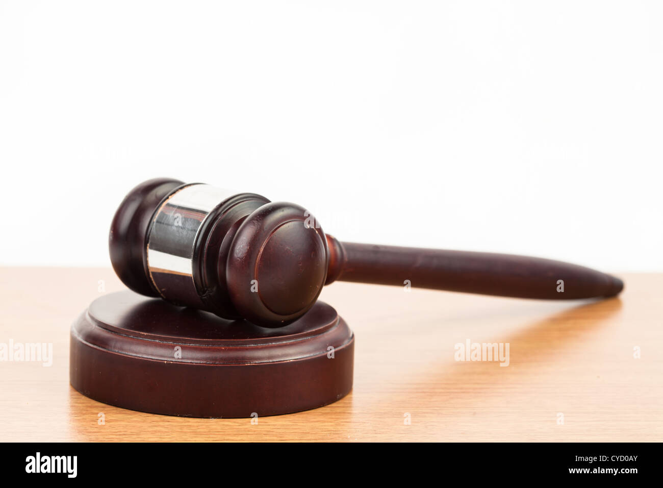 Hammer and gavel on desk Stock Photo - Alamy