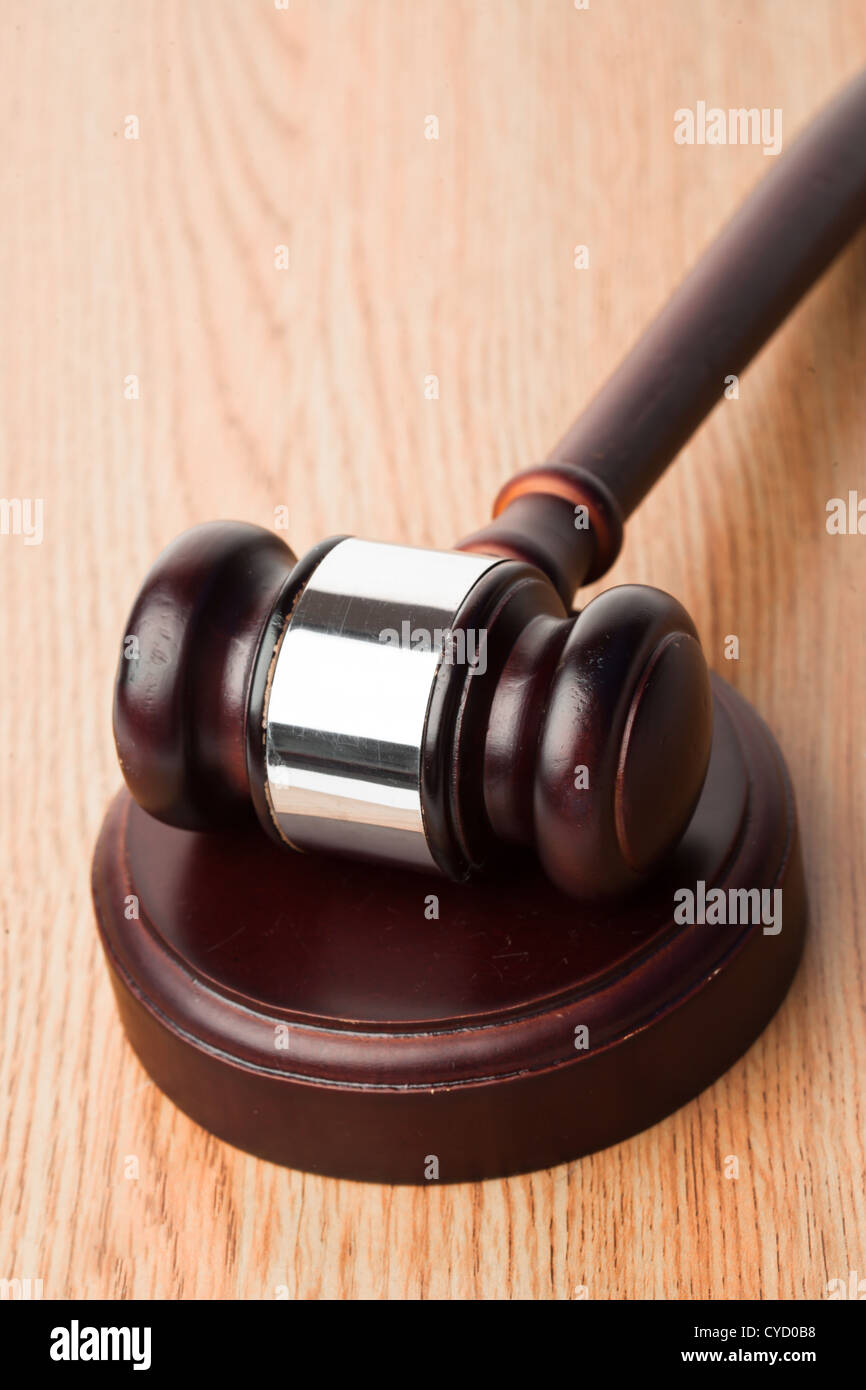 Gavel and a sound block on desk Stock Photo - Alamy