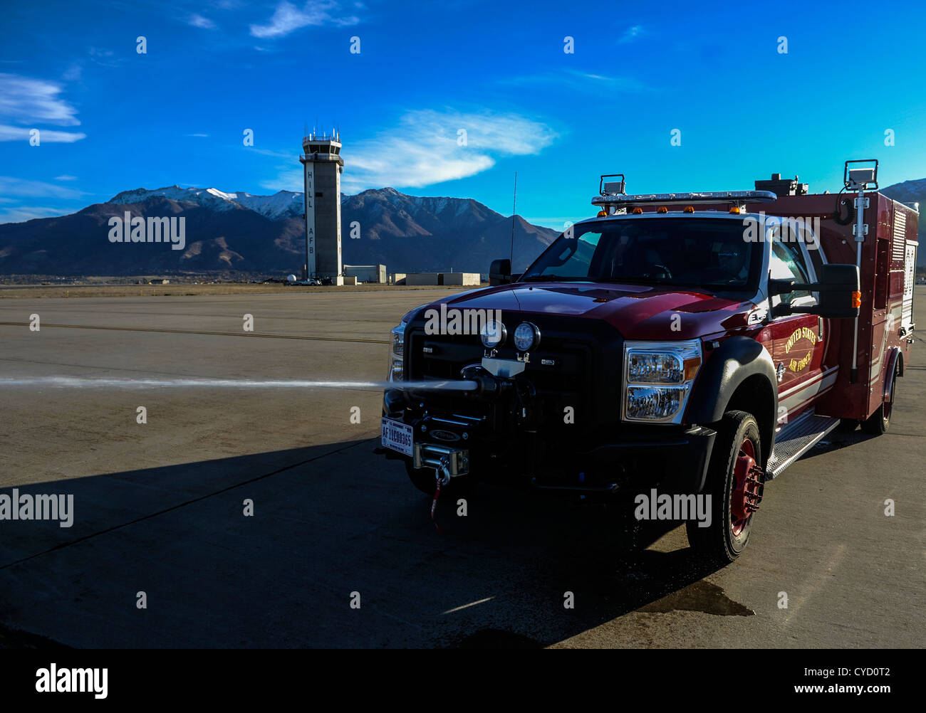 Captain Ernest Isley, a fire fighter at Hill Air Force Base, uses the ...