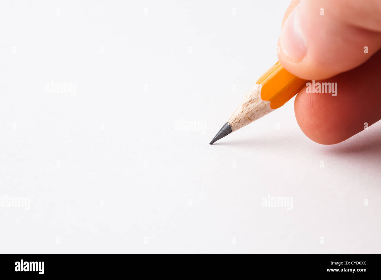 Man writing with pencil Stock Photo - Alamy