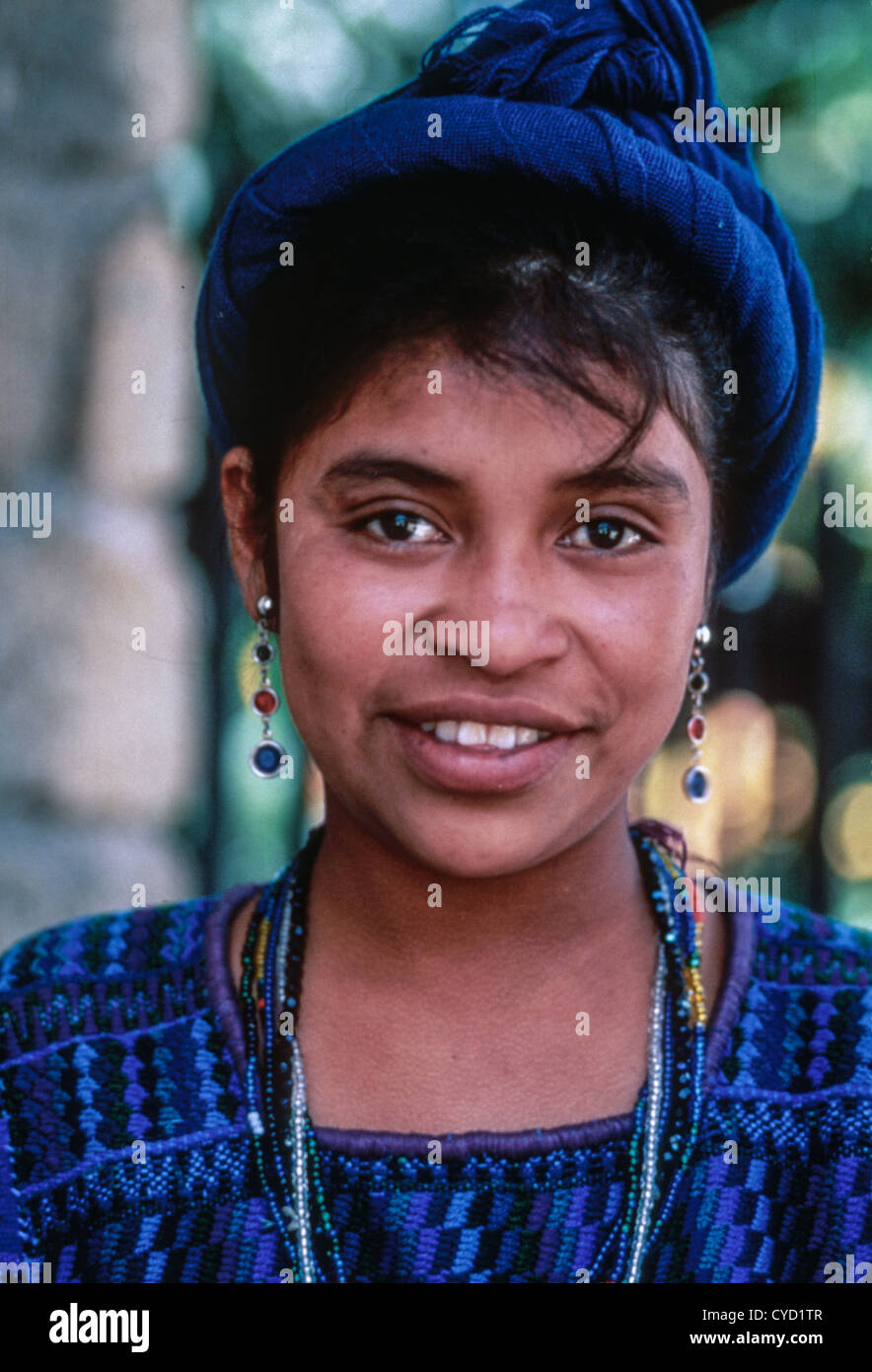Beautiful young Cakchiquel woman dressed in the traditional blue ...