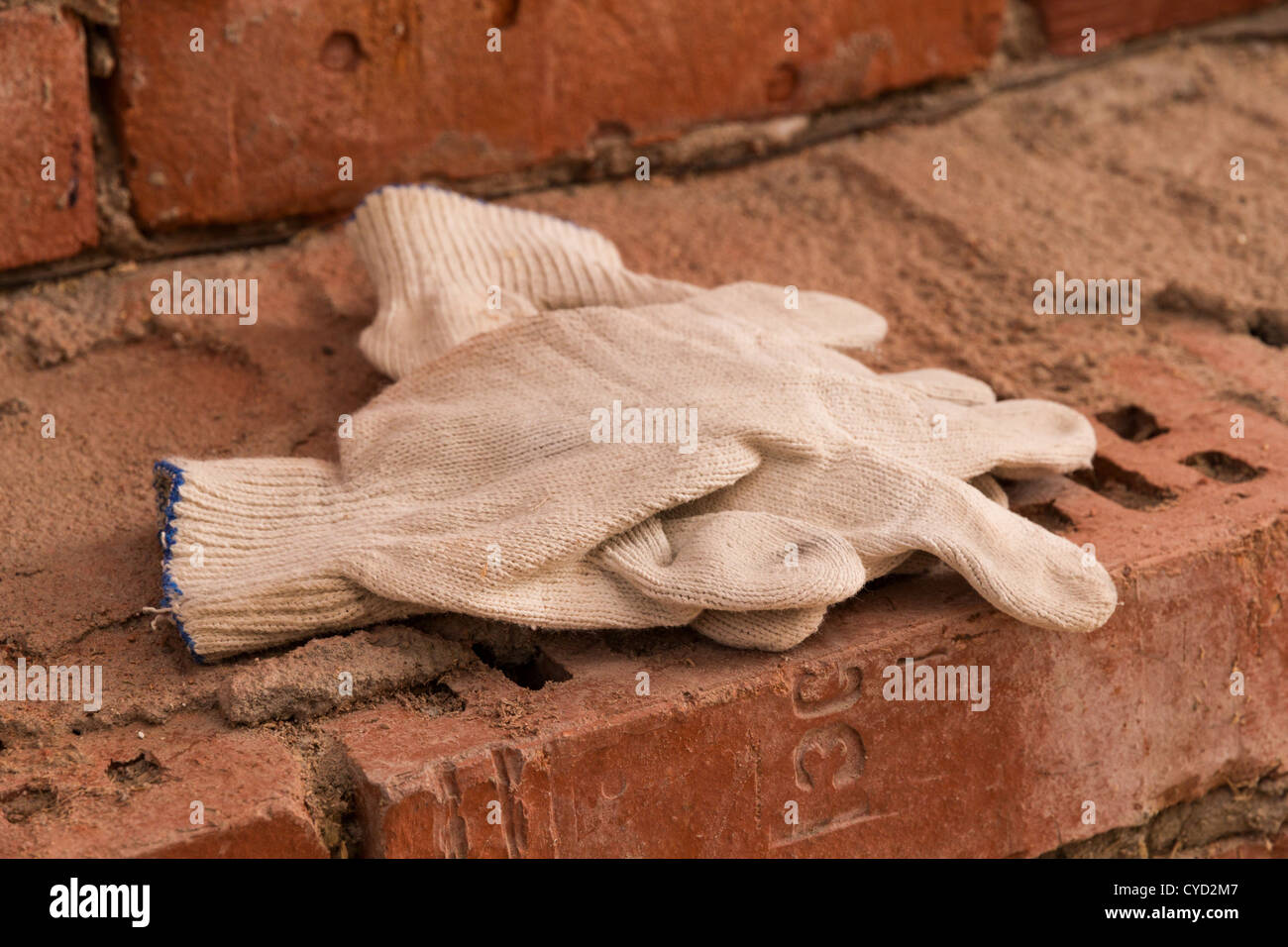 Construction brick protective gloves hi-res stock photography and ...