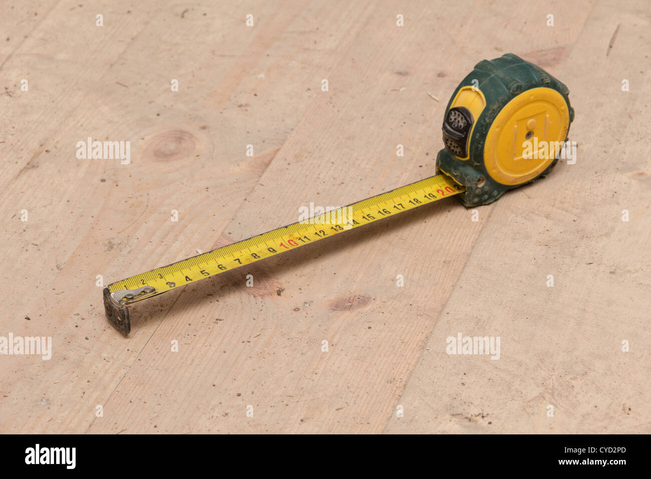 used open ruler on the wood floor Stock Photo - Alamy