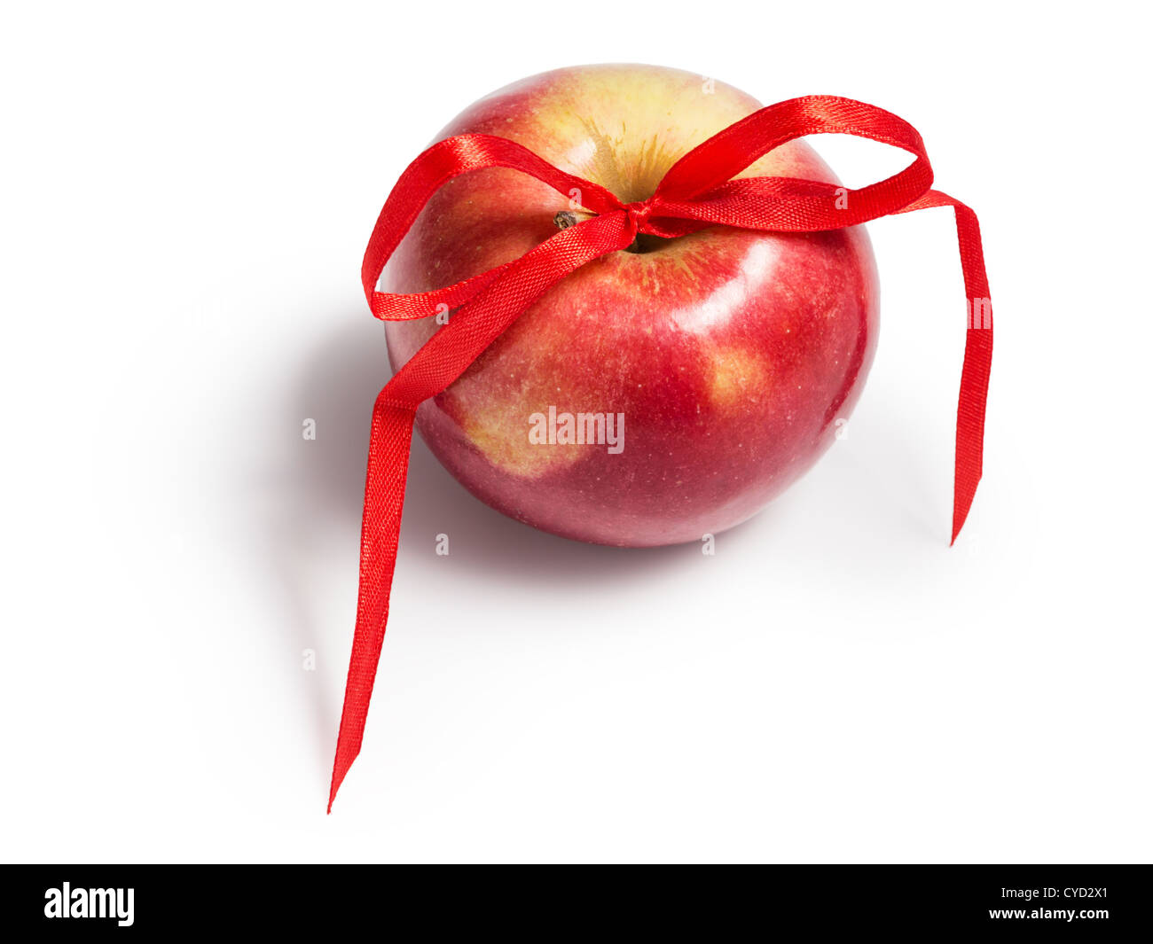 single red apple with ribbon bow isolated on white Stock Photo - Alamy