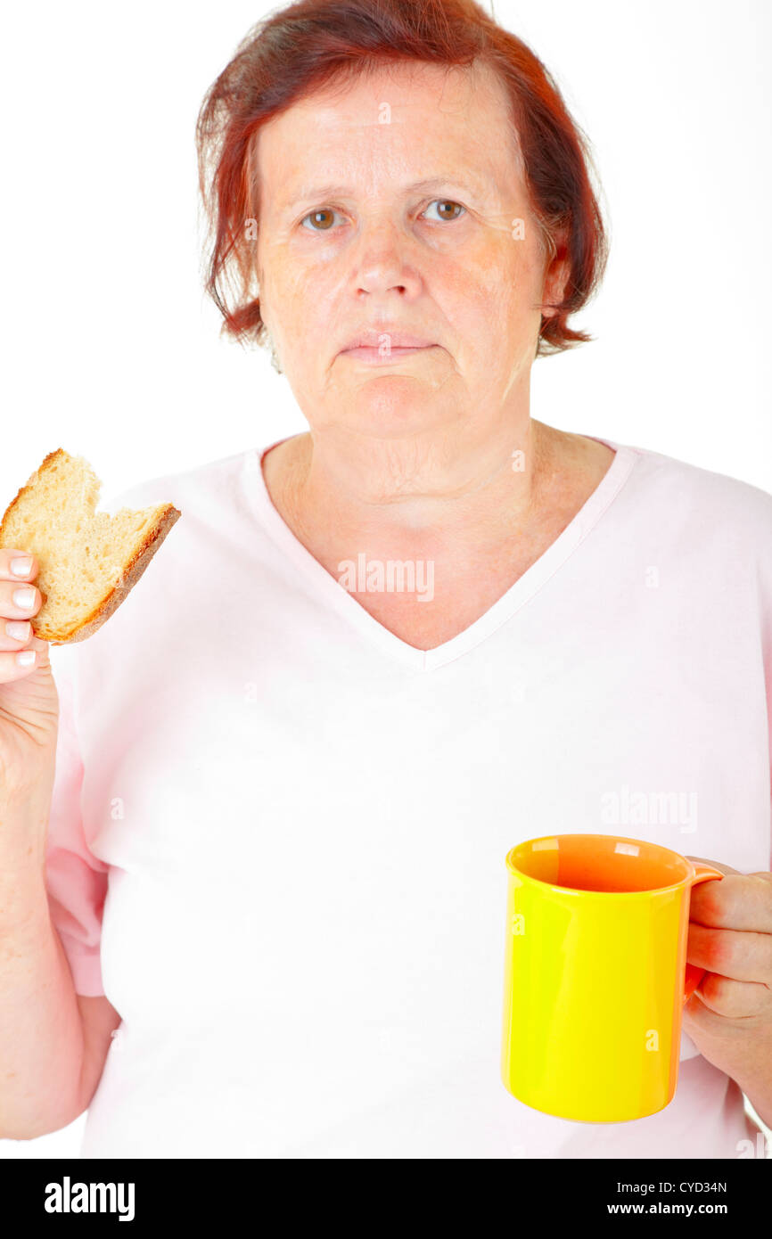 Beautiful senior woman eating bread hi-res stock photography and images ...
