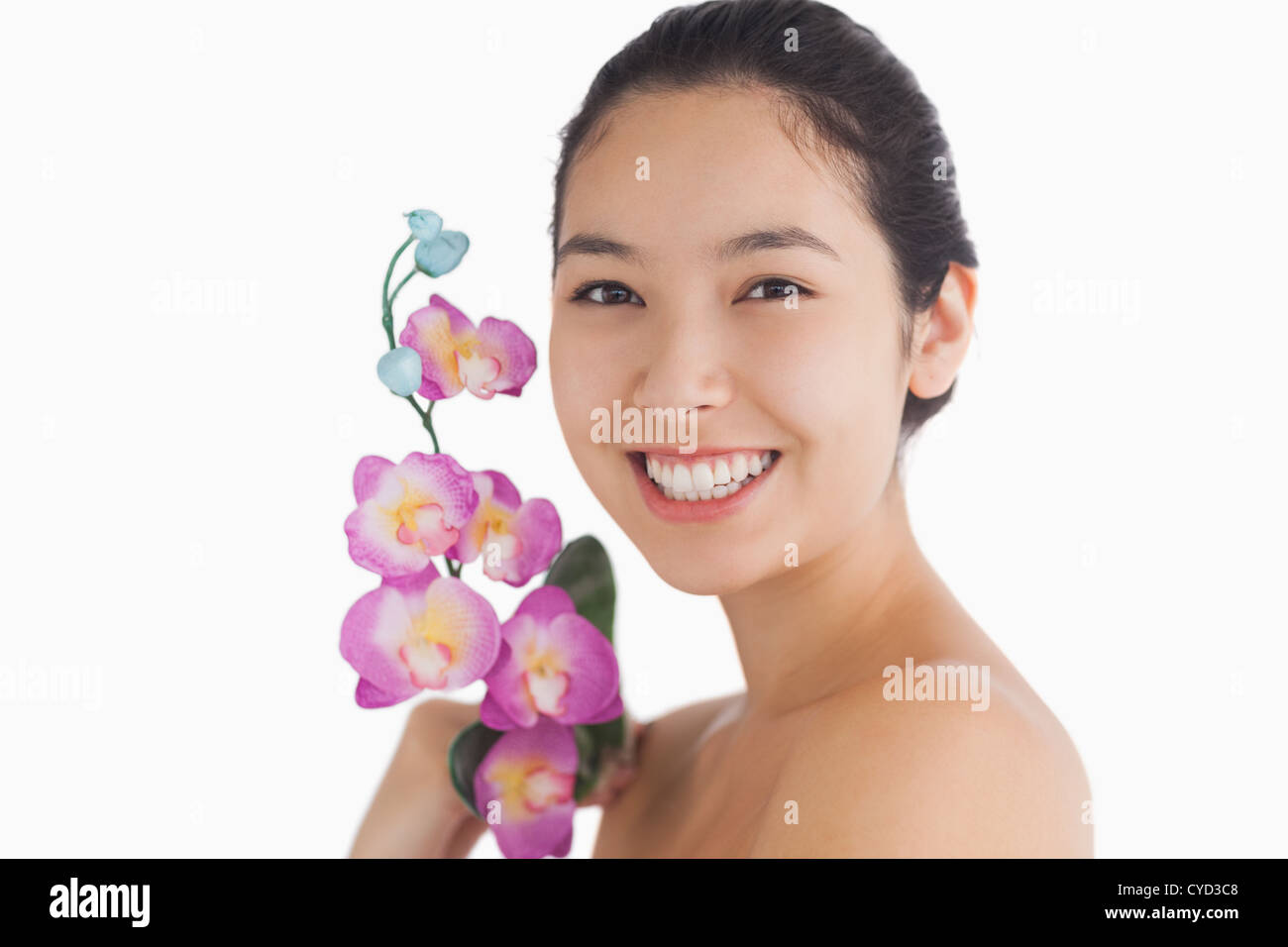 Woman holding orchids hi-res stock photography and images - Alamy