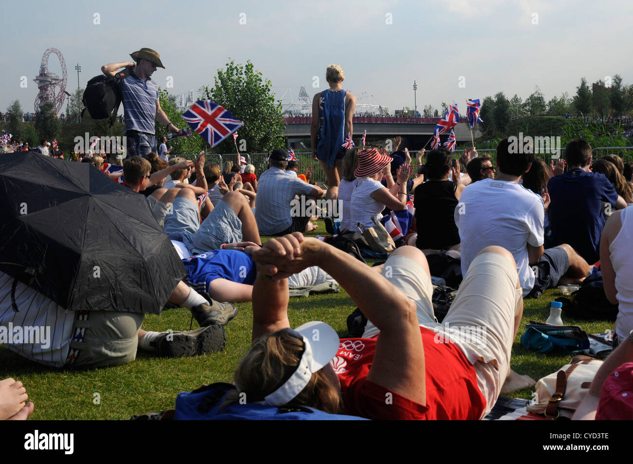 fans celebrate the Olympics and watch big screens in the grounds of the ...