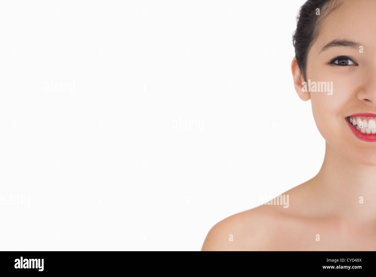 Half of woman's smiling face Stock Photo - Alamy