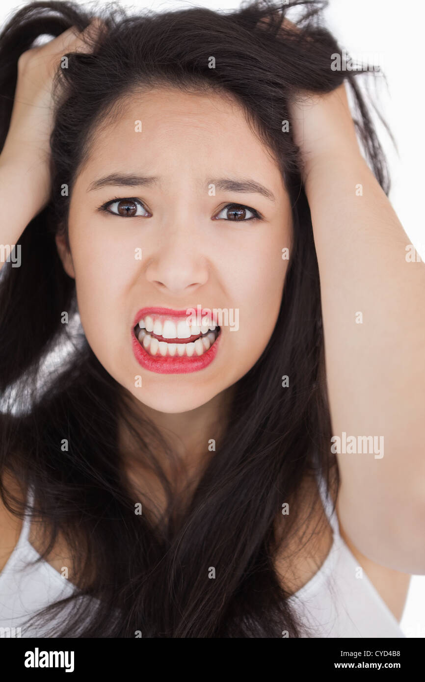 Woman looking angry Stock Photo - Alamy
