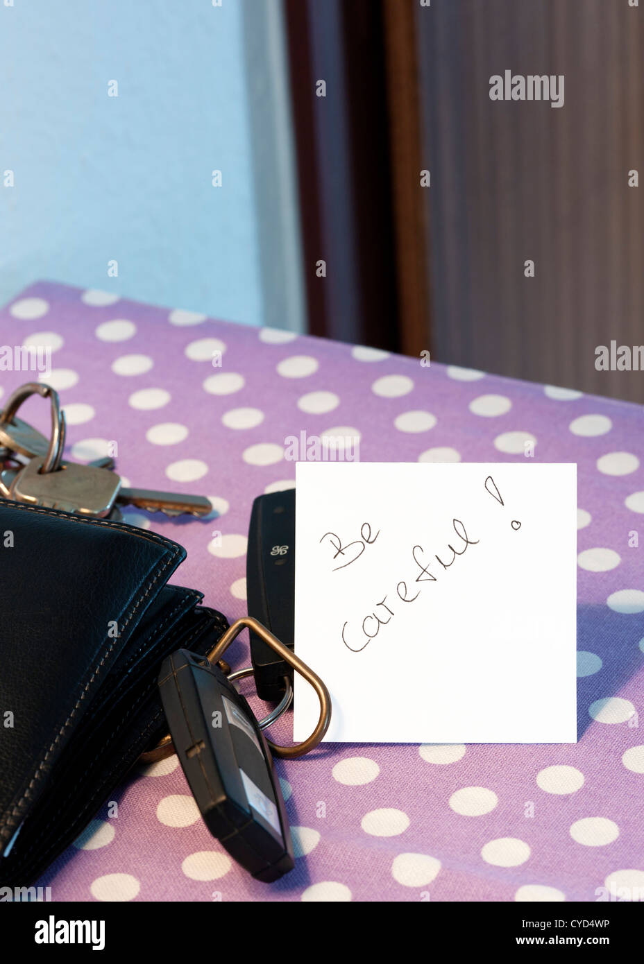 Car keys and reminder - be careful Stock Photo - Alamy