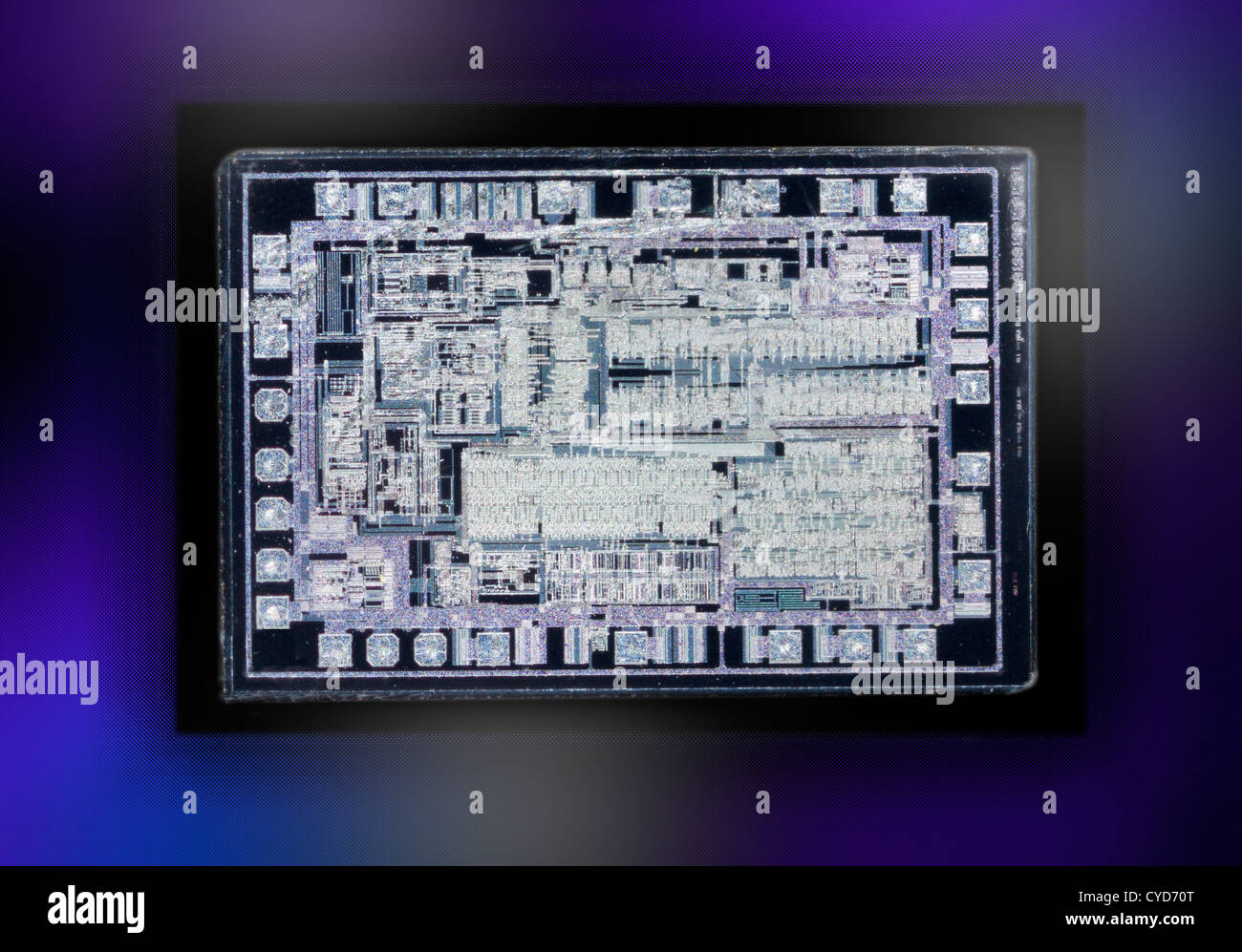 Macro photograph of a Silicon chip, integrated circuit, read - write ...