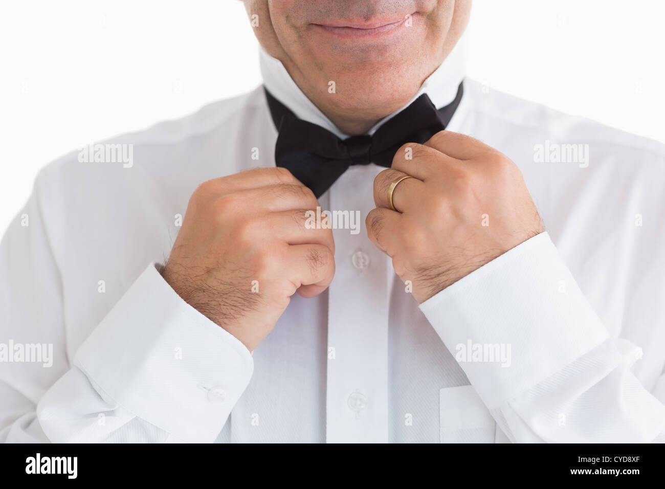 Fixing bow tie hi-res stock photography and images - Alamy