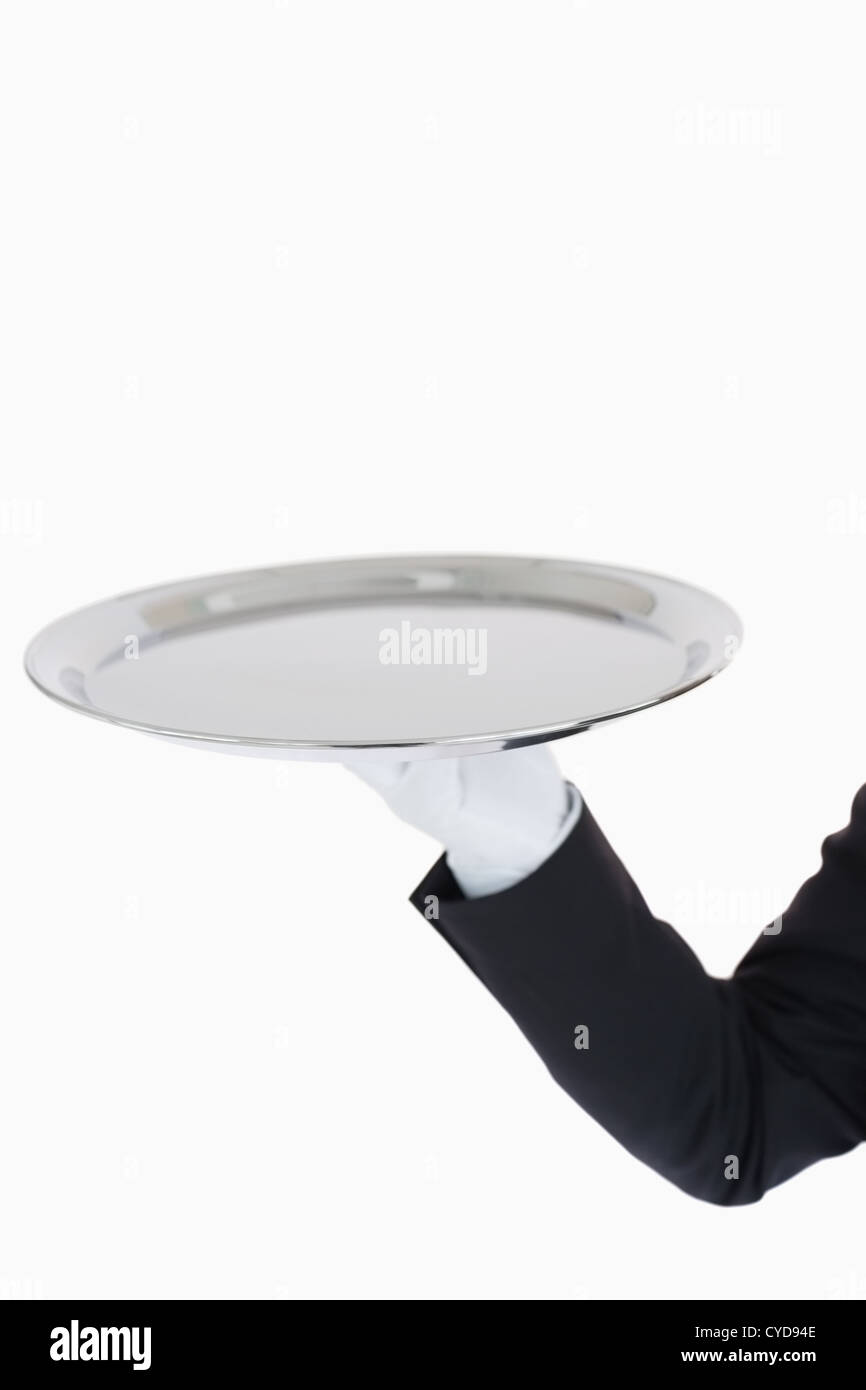 White gloved hand holding silver hi-res stock photography and images ...