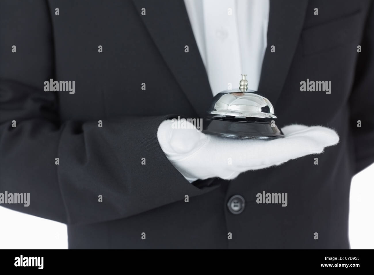 Man holding a hotel bell Stock Photo - Alamy