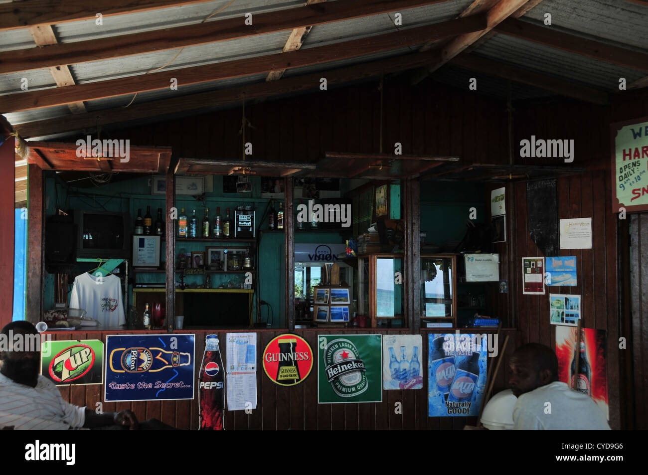 People african west indian men 40s sitting relaxing tables bar front hi ...