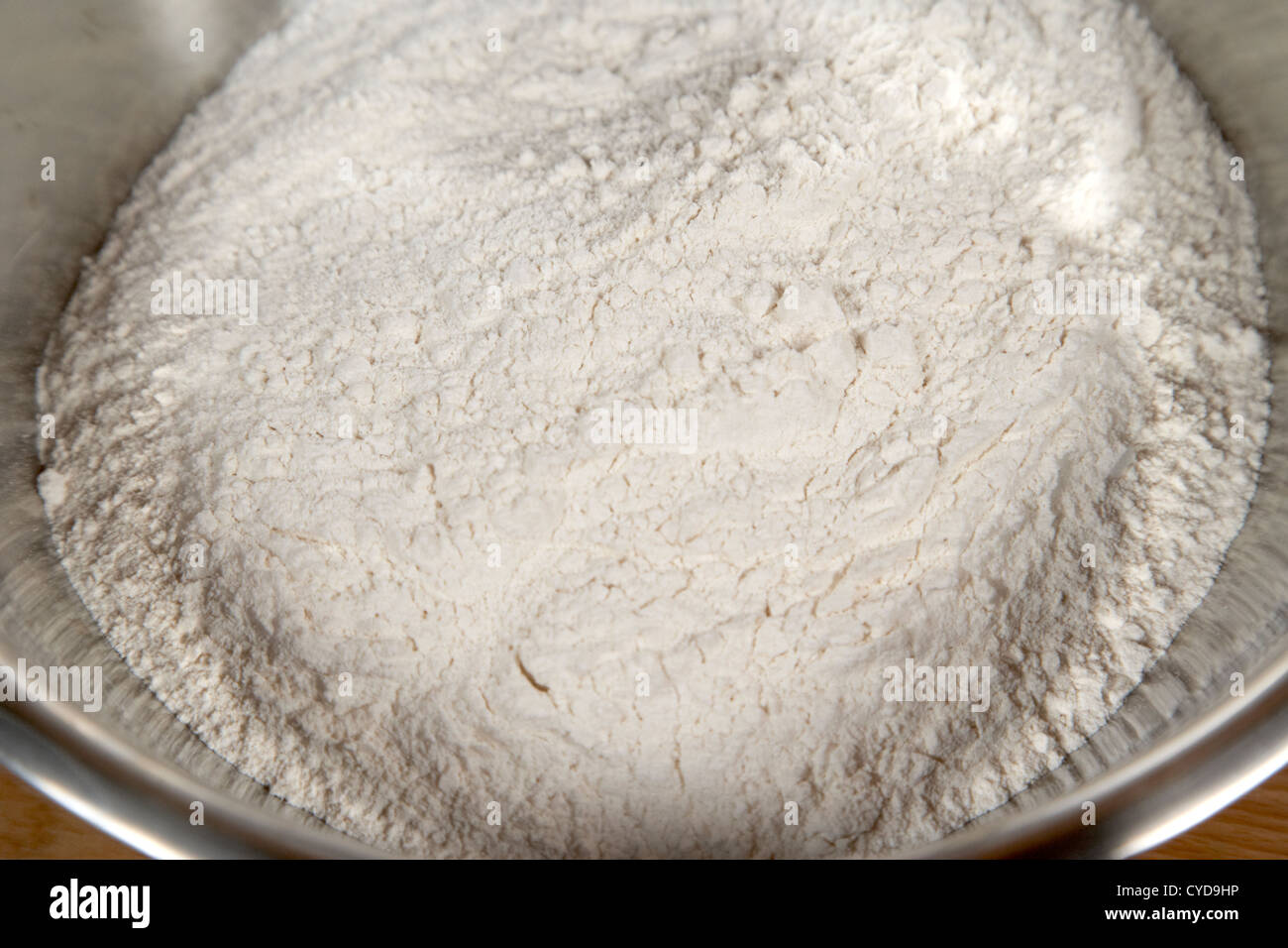 plain flour in a metal bowl for baking Stock Photo - Alamy