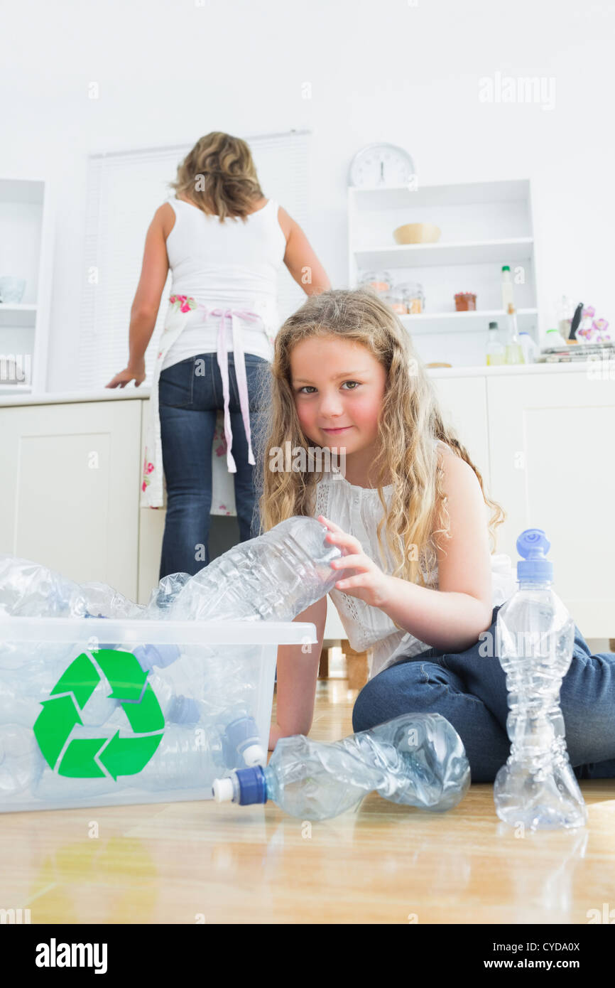Daughter sorting plastics Stock Photo - Alamy
