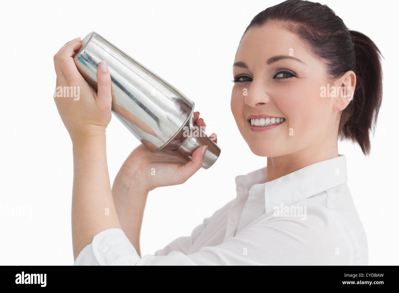 Woman mixing a cocktail Stock Photo - Alamy